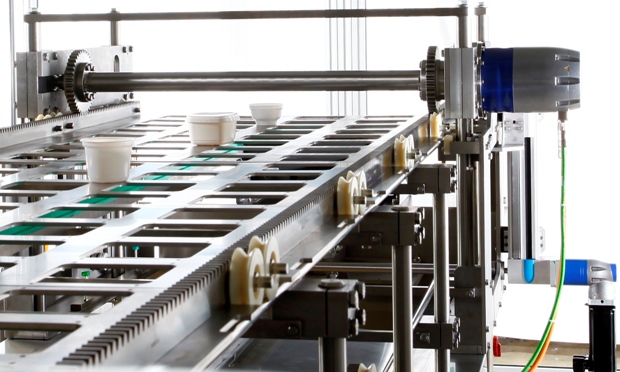 Oystar USA launches chainless transport system for filling lines