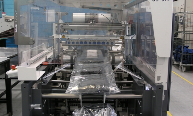 Beck machines help OCS wrap blankets for planes