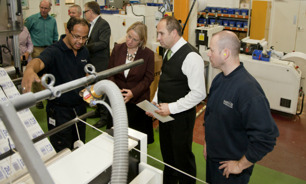 Green Party leader presents living wage accreditation to Watermill Press