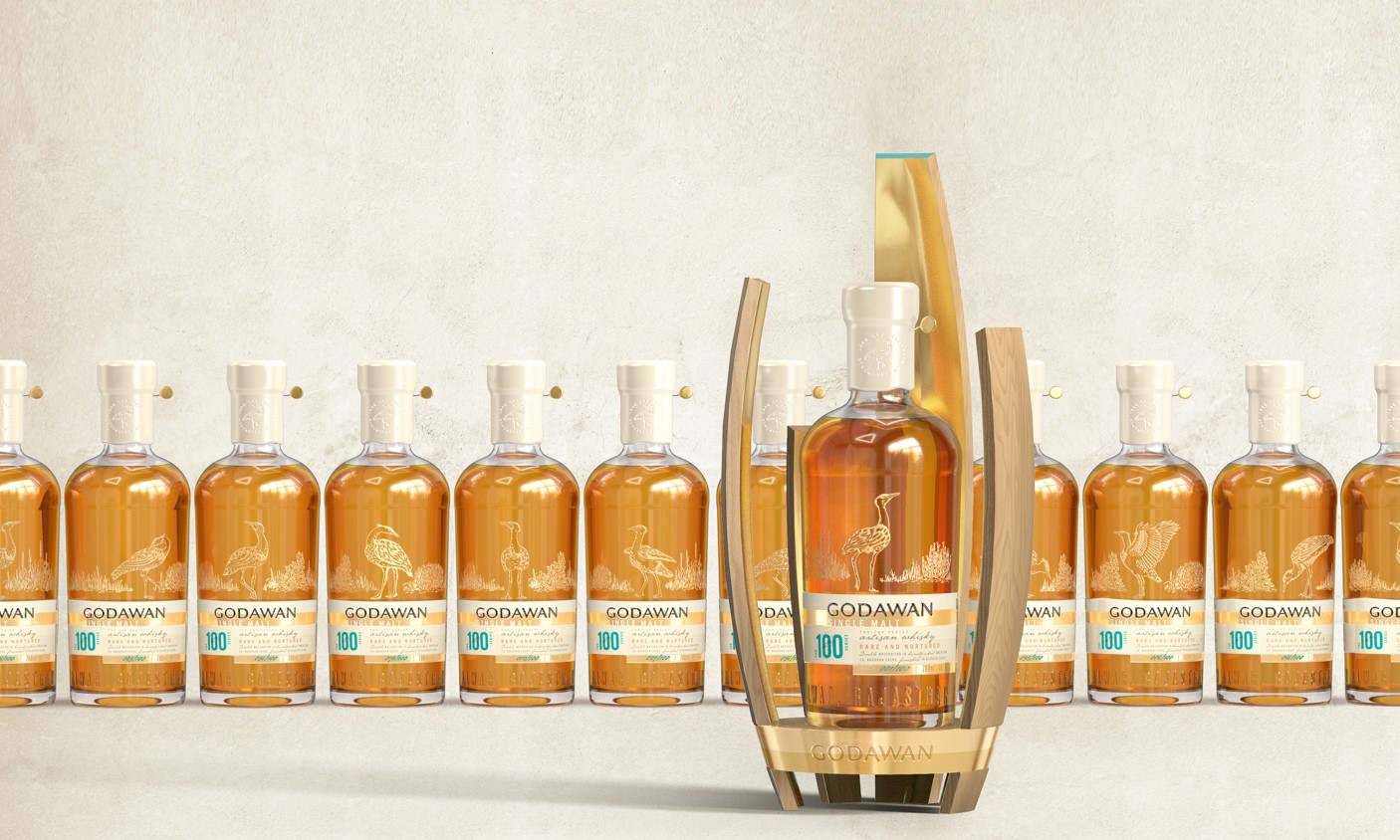 Butterfly Cannon behind luxury bottles for Godawan 100 Series