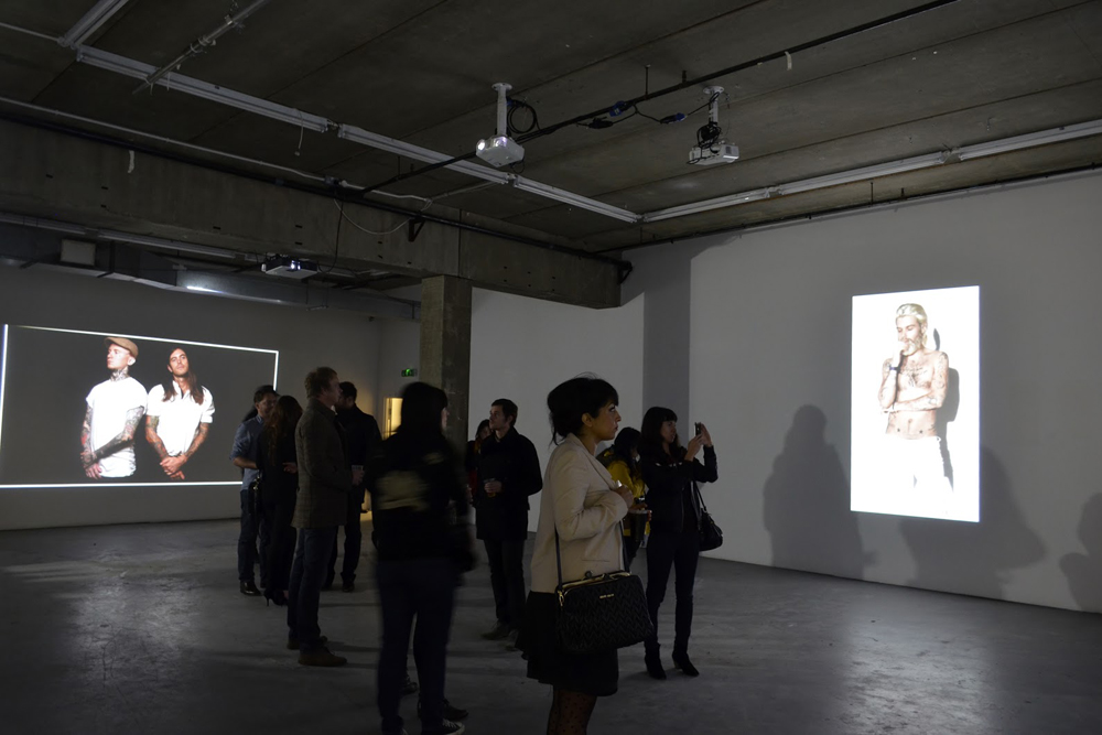 Aurora supplies short throw projectors for moving portrait exhibition ...