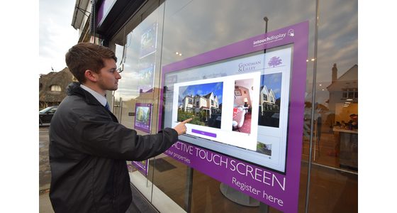 Estate agent stands out with touch screen window display | AV Magazine
