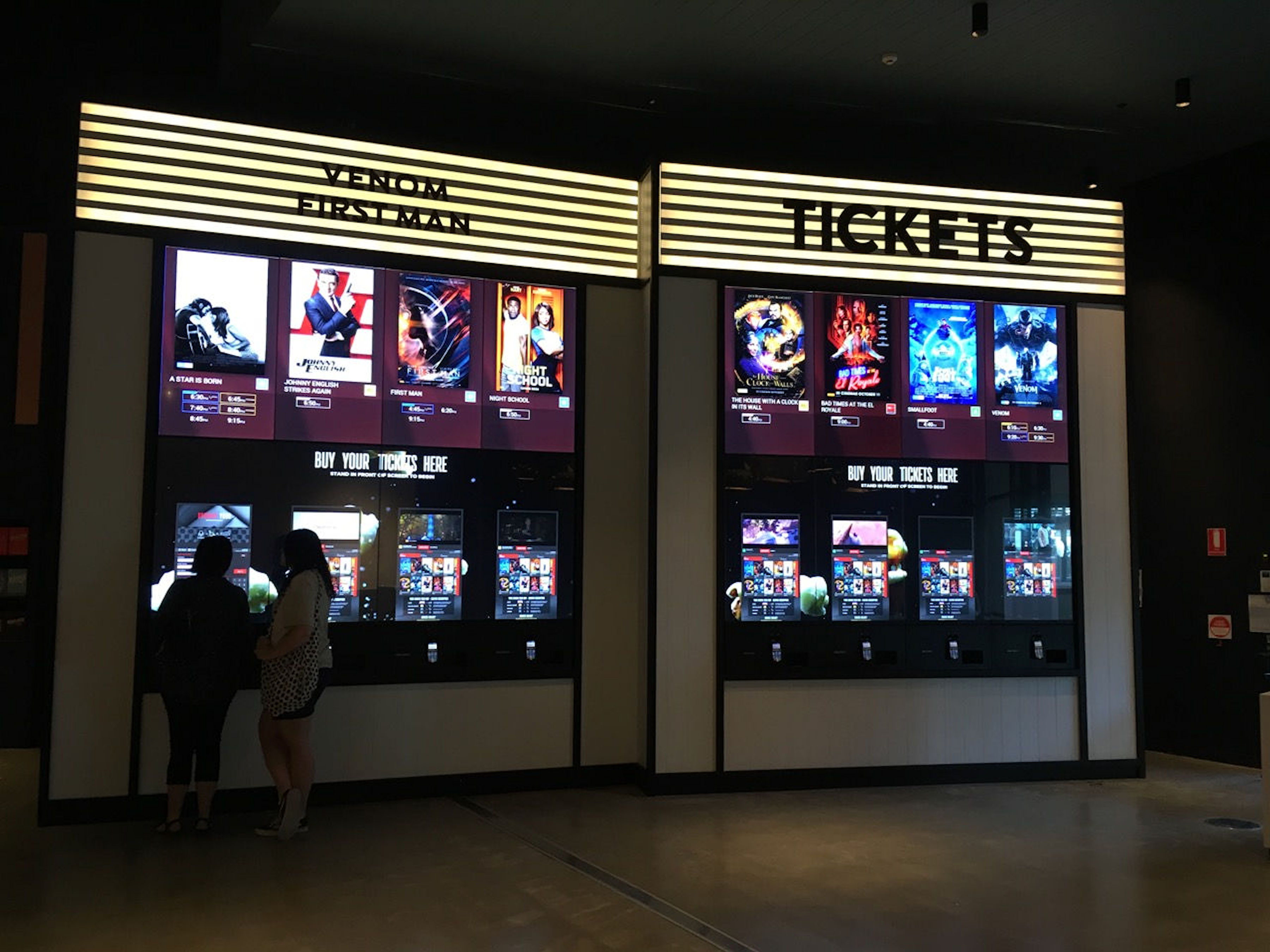 Combined video wall and ticket kiosk saves space and cost