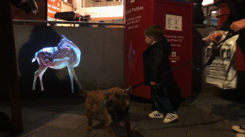 Moving AR projection shows deer at play at night | AV Magazine