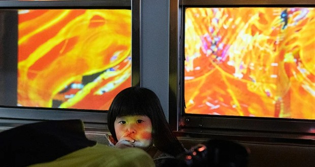 Eight projectors cast art from train on to passing scenery | AV Magazine