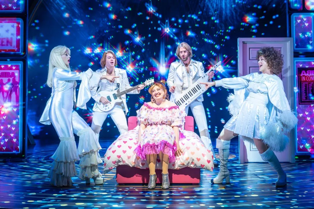 INFiLED takes to the stage in Muriel’s Wedding the Musical | AV Magazine